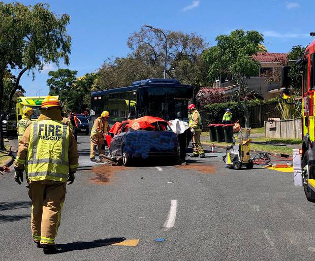 Kids among injured in fatal crash between bus and car