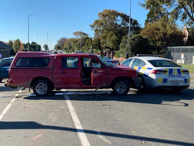 Ute smashes into police car after family harm incident